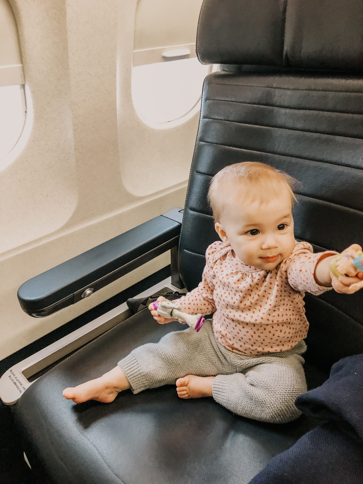 5 Tips for Flying with a Lap Infant | meltedandmoved.com